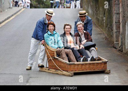 Portugal, Madeira.“Monte sledge” ride from Monte downhill to Funchal ...