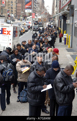 Potential employees queue up at job fair Stock Photo - Alamy