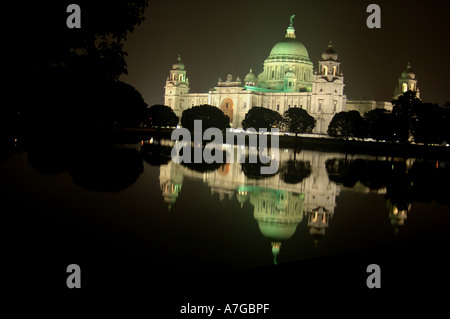 Night view of Victoria Memorial monument dome with moving angel statue ...
