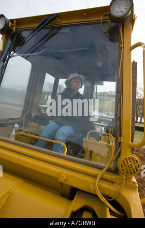 Female bulldozer operator Stock Photo - Alamy