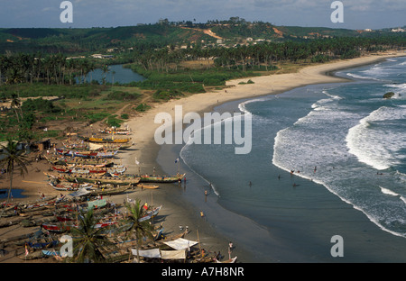 fishing pirogues lying on the beach in the village Biriwa, Ghana Stock ...