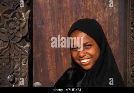 Swahili girl wearing a traditional buibui, Arab Fort, Lamu, Kenya Stock ...