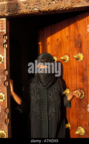 Swahili girl wearing a traditional buibui, Arab Fort, Lamu, Kenya Stock ...