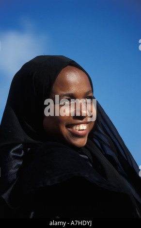 Swahili girl wearing a traditional buibui, Arab Fort, Lamu, Kenya Stock ...