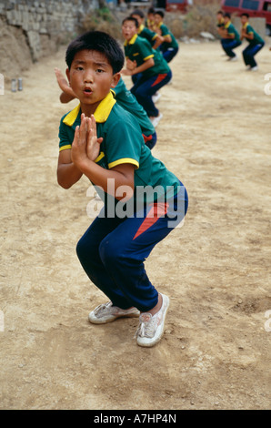 Henan,CHINA-Shaolin boys practice kung fu in the sweltering heat during ...