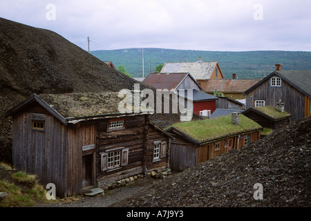 Timber houses with grass rooves in the former copper mining town of ...