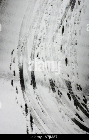 Traces of tires, in the snow, tire profiles Stock Photo - Alamy