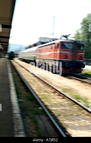 Train Locomotive Pulling Out of a Train Station Stock Photo - Alamy
