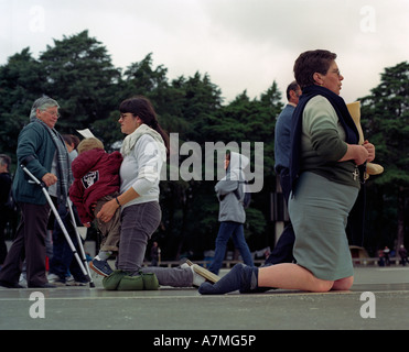 Catholic faithful crawl on hands and knees in pilgrimage to the statue ...