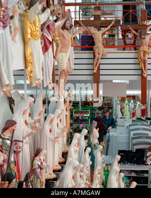 A souvenir shop in Fatima filled with candles in the shape of children ...