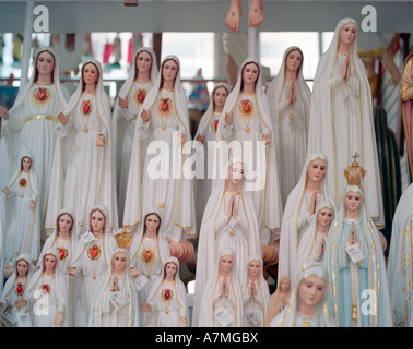A souvenir shop in Fatima filled with candles in the shape of children ...