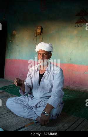 Egyptian man drinking tea, Siwa, Egypt Stock Photo - Alamy