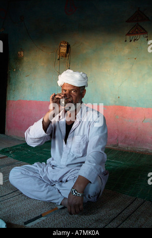 Egyptian man drinking tea, Siwa, Egypt Stock Photo - Alamy