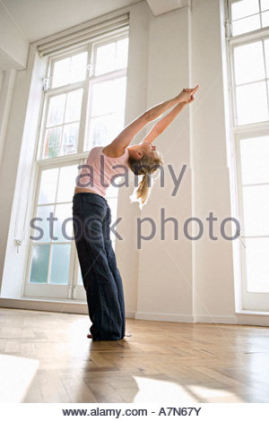Young woman stretching arms above head Stock Photo: 21816350 - Alamy