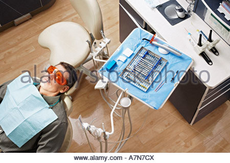 High angle view of a male patient lying unconscious on the floor Stock ...