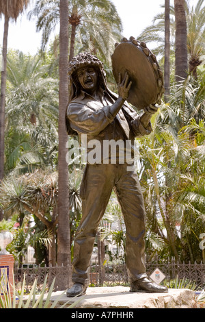 Malaga, Spain. Statue of gypsy dancer playing tambourine in Malaga ...