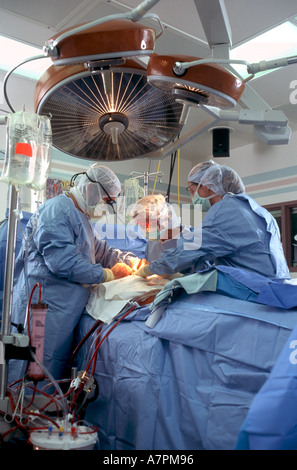 Open heart surgery. This surgery is being carried out to replace a ...