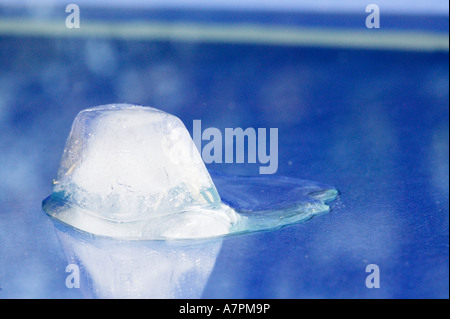Melting Ice cube Stock Photo - Alamy