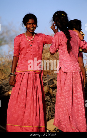 India, Rajasthan, Jodhpur, Bishnoi Village. Bishnoi man demonstrating ...