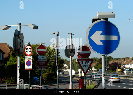 Confusing Road signs at a busy junction in South London England Stock ...