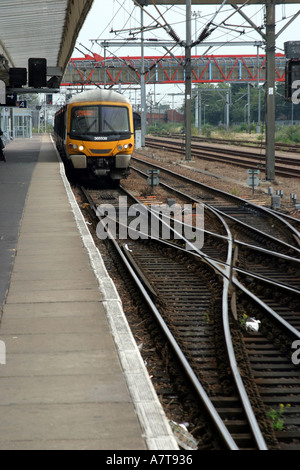 Railway tracks and train at Cambridge Station, England, UK Stock Photo ...