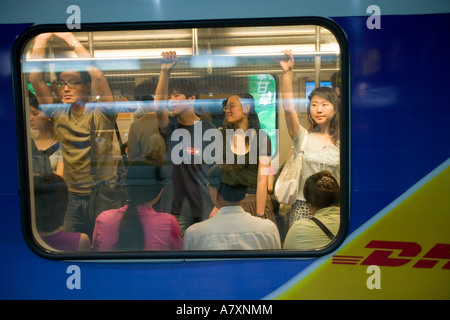 Asia China Shanghai Passengers crowded onto Metro underground subway ...