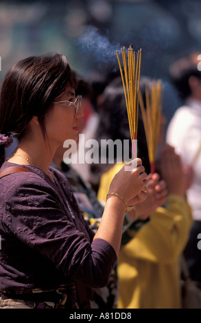 Chinese Lady Praying At Wong Tai Sin Temple Kowloon Hong Kong Stock ...