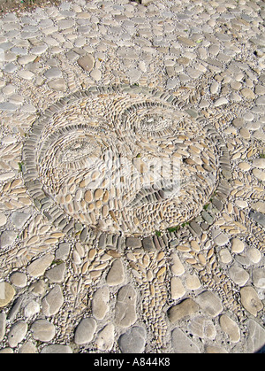 sun figure face made out of stonea and pebbles Stock Photo - Alamy