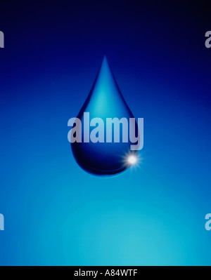 close up drop of water on blue background Stock Photo - Alamy
