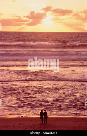 Sunset on the sea with the waves Stock Photo - Alamy