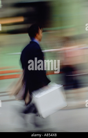 Man running to catch plane Stock Photo - Alamy
