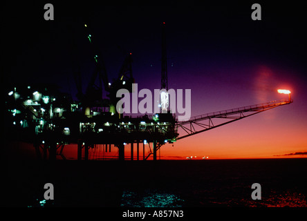 Australia. Bass Strait. Off shore oil and gas field and rig at sunrise ...