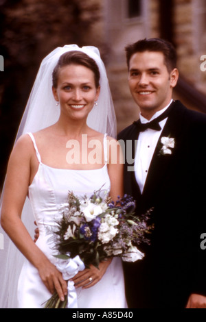 Smiling wedding couple Stock Photo - Alamy