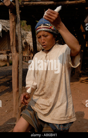 Akha woman spinning Luang Nam Tha Province Northern Laos Stock Photo ...