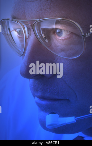 male switchboard operator with headset Stock Photo - Alamy