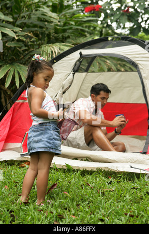 Pretty hispanic girl in 20s smiling to camera posing in park Stock ...
