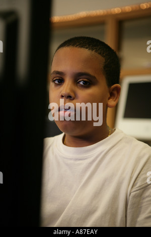 Portrait of an adolescent boy with a serious stare Stock Photo - Alamy