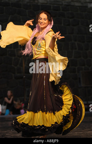 Gypsy Dancer in Vibrant Yellow Paisley Skirt and Top Set Stock Photo ...