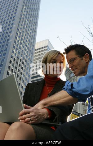 Mature couple working on laptop at home Stock Photo - Alamy