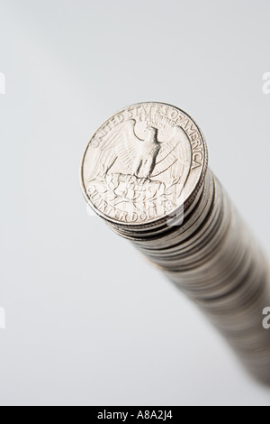 a stack of United States five dollar bills isolated on white background ...