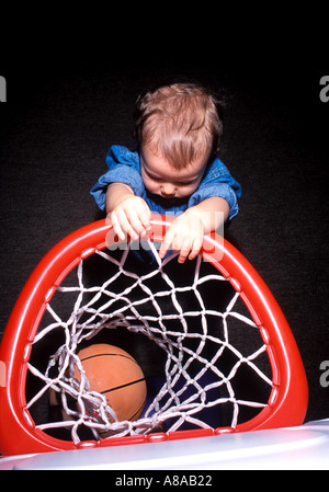 Baby Dunking Basketball Stock Photo - Alamy