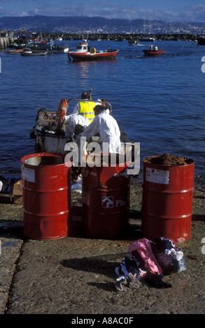 PRESTIGE OIL SPILL Small fishing boat used to recover oil is cleaned ...