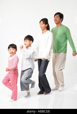 family members stood in order of height Stock Photo - Alamy