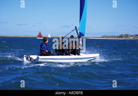 Kids dingy sailing Stock Photo - Alamy