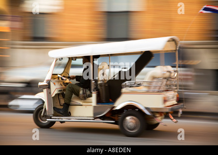 Three-wheeled vehicle in street of fortified citadel Stock Photo - Alamy