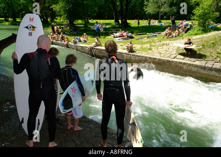 Board surfing on river Isar Munich Bayern Germany Stock Photo - Alamy