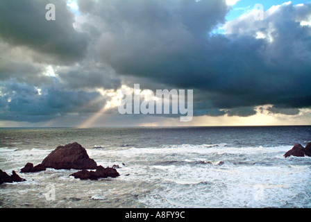 Scenic view of rocks in sea Stock Photo - Alamy