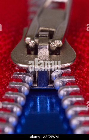 Red zipper opening Stock Photo - Alamy
