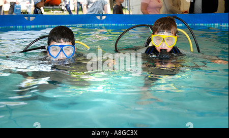 Boy taking scuba diving lessons Stock Photo - Alamy