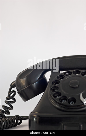 Black telephone with rotary dial close up Stock Photo - Alamy